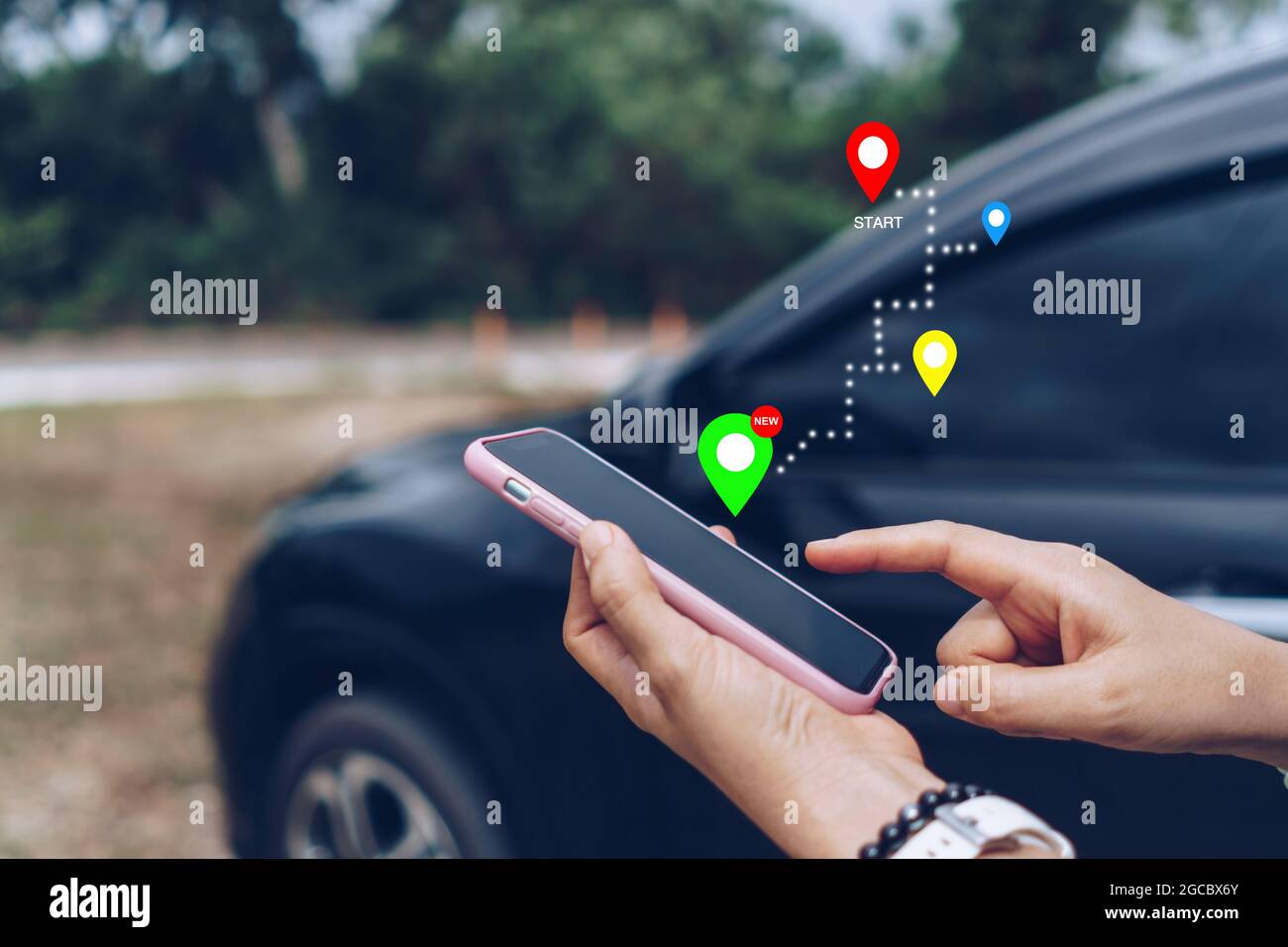 Woman use smartphone to look up map plan route for travel. Road trip ...