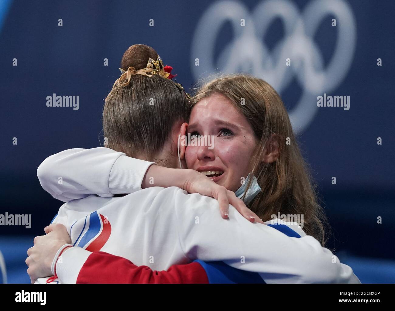 Tokyo, Japan. 8th Aug, 2021. Coach of Team ROC comforts athlete after ...