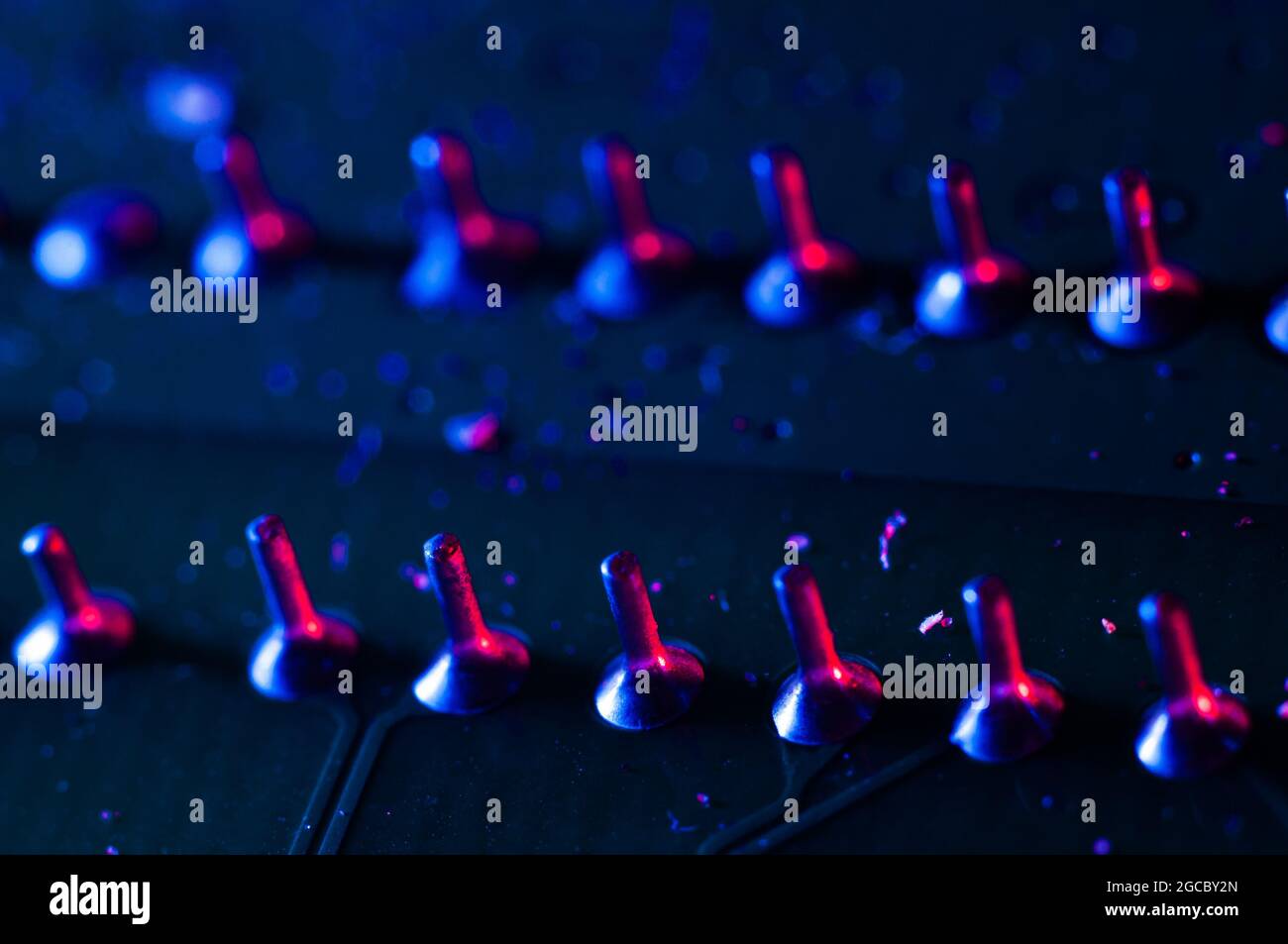The reverse side of the electronic circuit board in macro photography ...