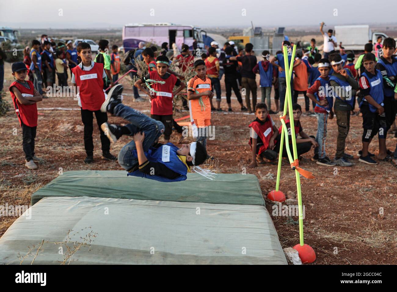 Idlib City, Syria. 07th Aug, 2021. A Syrian child competes in a track ...