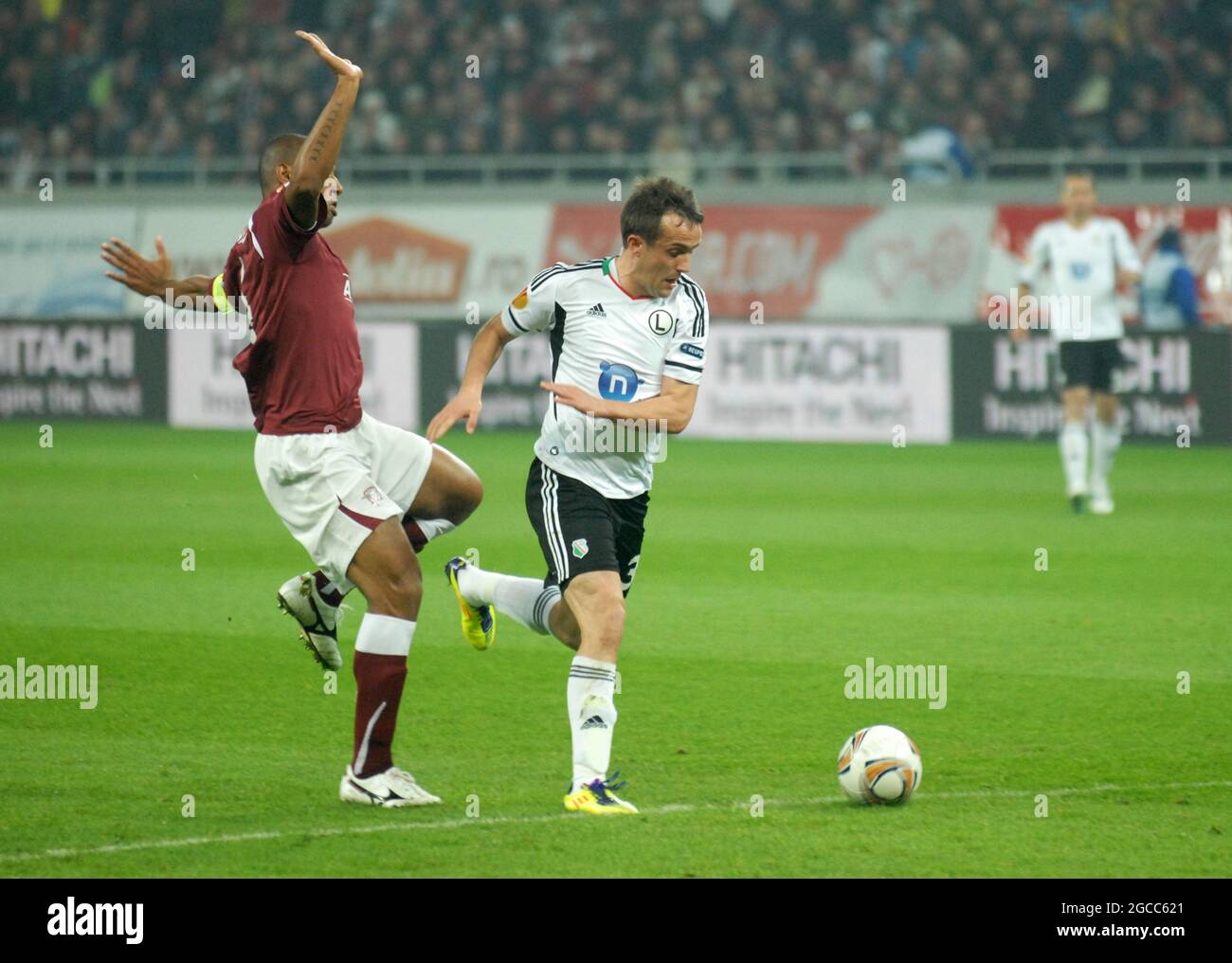 BUCHAREST, ROMANIA - OCTOBER 20, 2011: Miroslav Radovic (R) of Legia ...