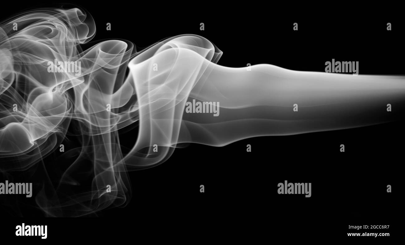Wide smoke line with curles isolated on black background Stock Photo ...