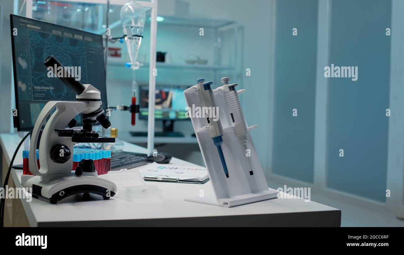 Close up of micro pipette tool and medical equipment in empty ...