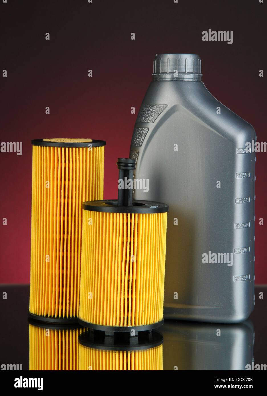 Car oil filters and motor oil can on dark color background Stock Photo ...