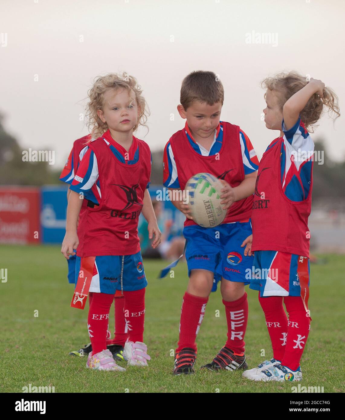 young kids playing rugby in abu dhabi Stock Photo - Alamy
