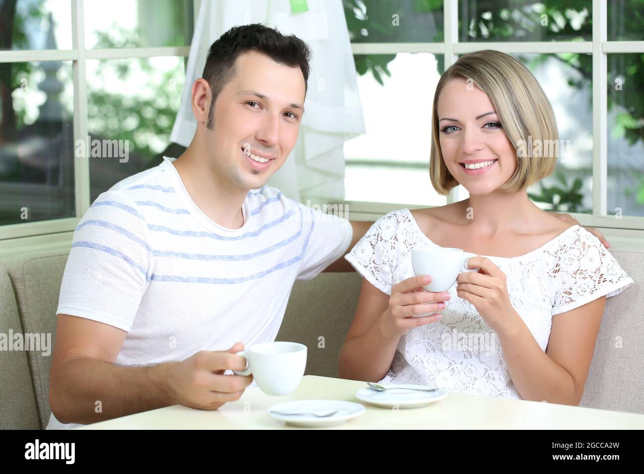 Beautiful couple having romantic dinner at restaurant Stock Photo - Alamy