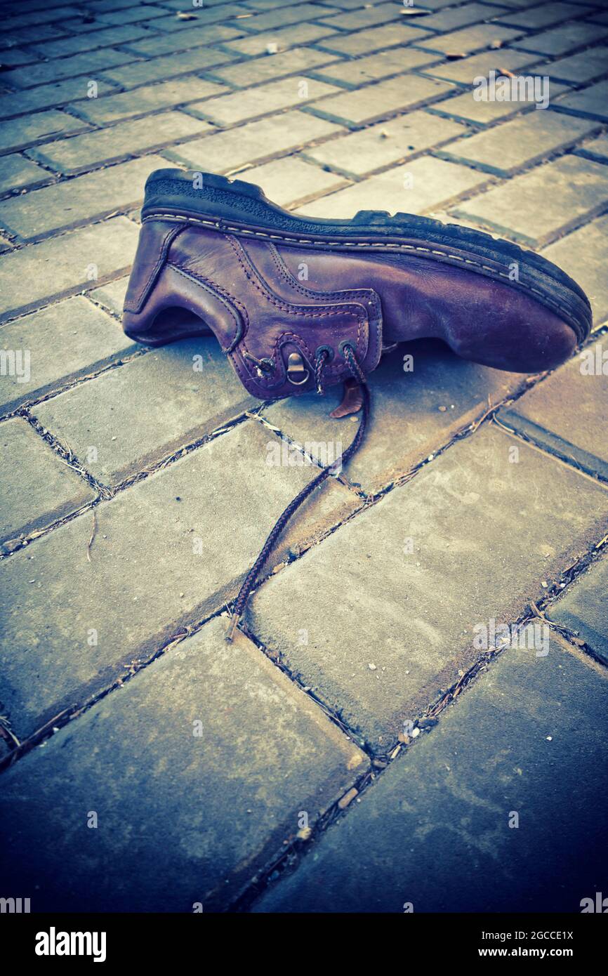 Abandoned shoe hi-res stock photography and images - Alamy