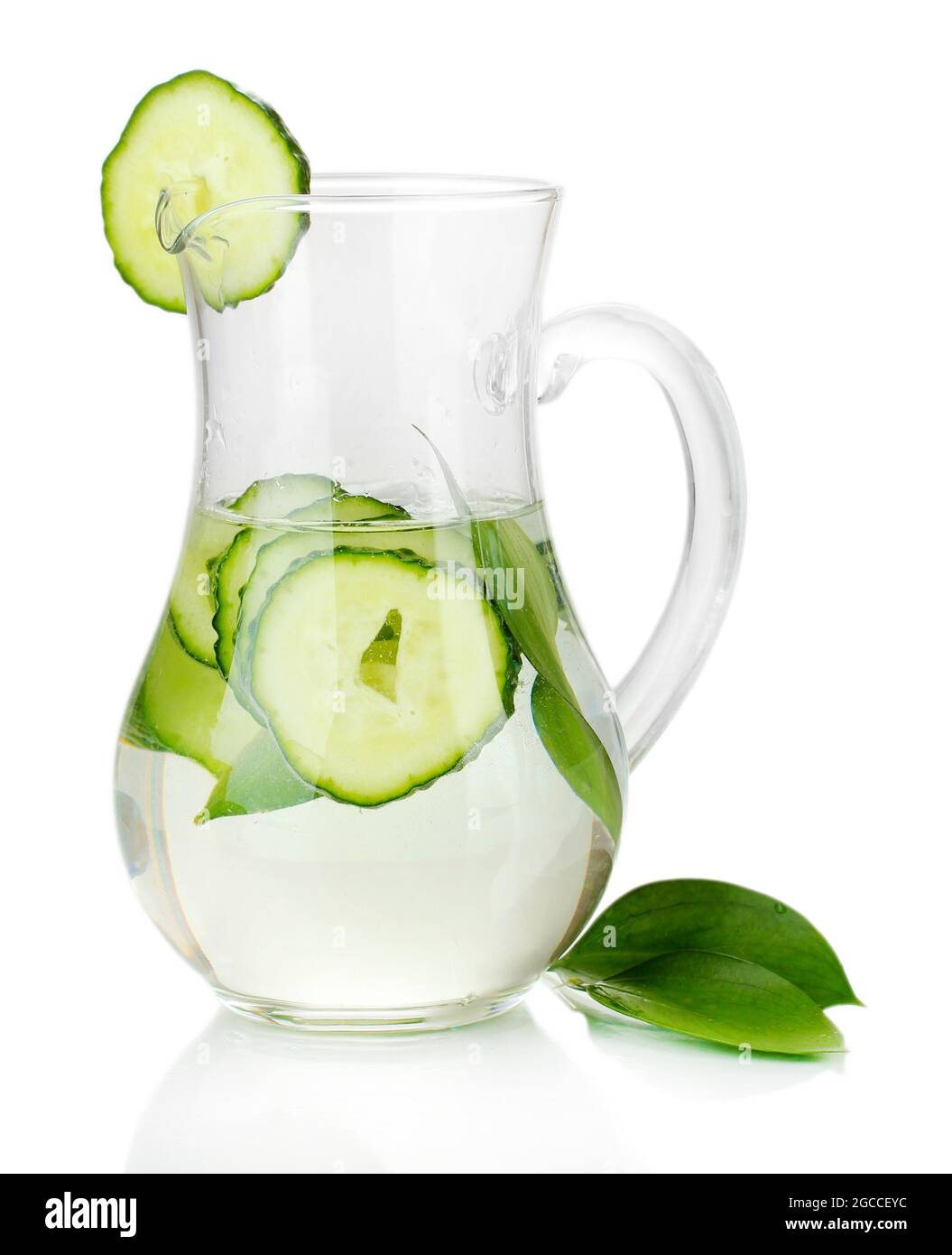 Cold water with cucumber and ice in pitchers isolated on white Stock ...