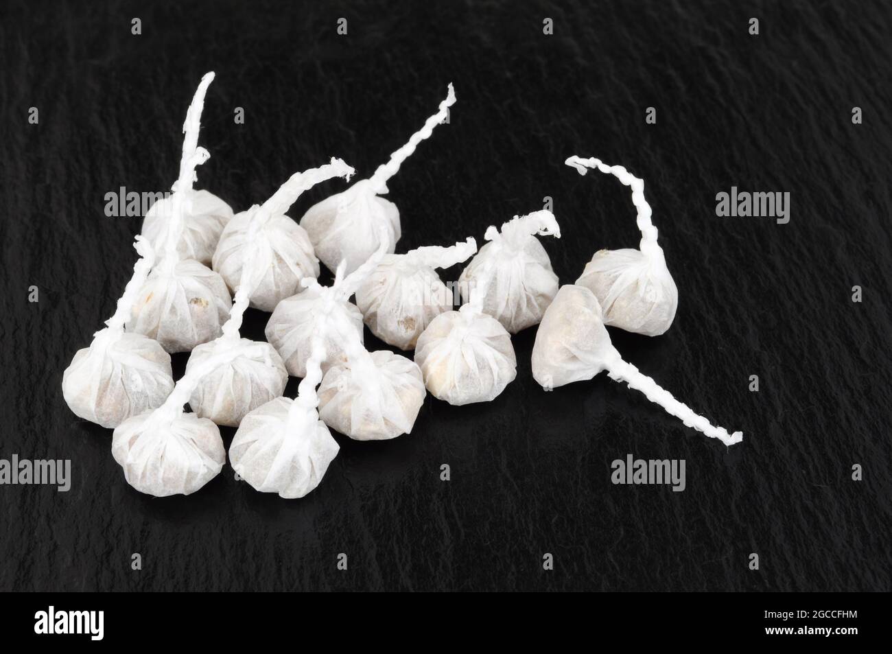 Group of fun snaps or throw downs on a slate stone background Stock ...