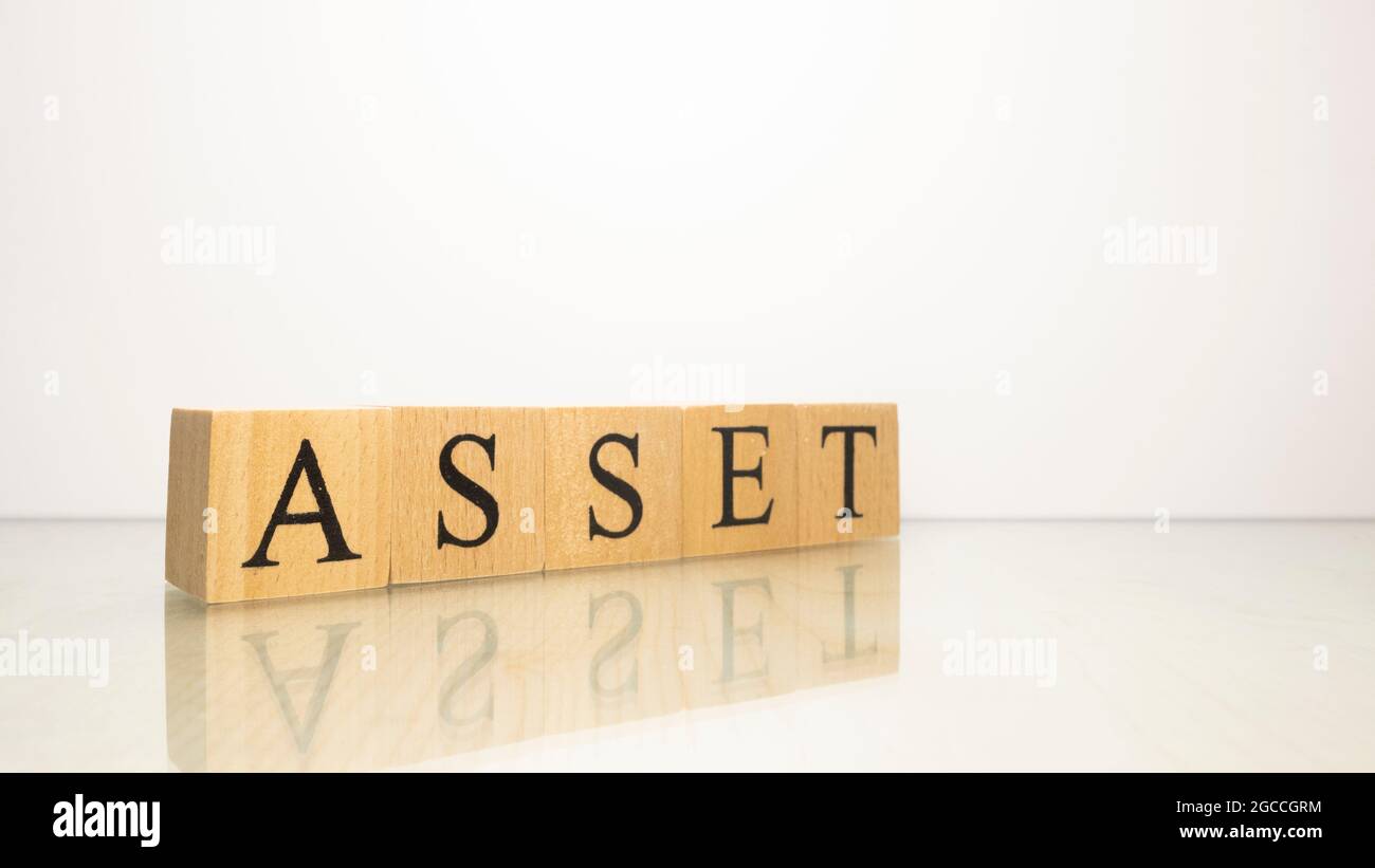 The asset name was created from wooden letter cubes. finance and ...