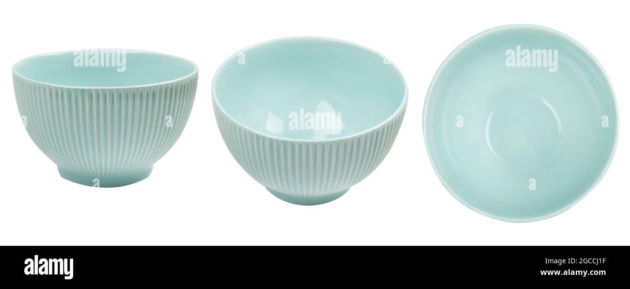 Blue ceramic bowl isolated on white background. View from side and from ...