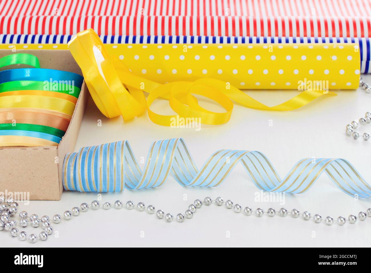 Materials and accessories for wrapping gifts isolated on white Stock ...