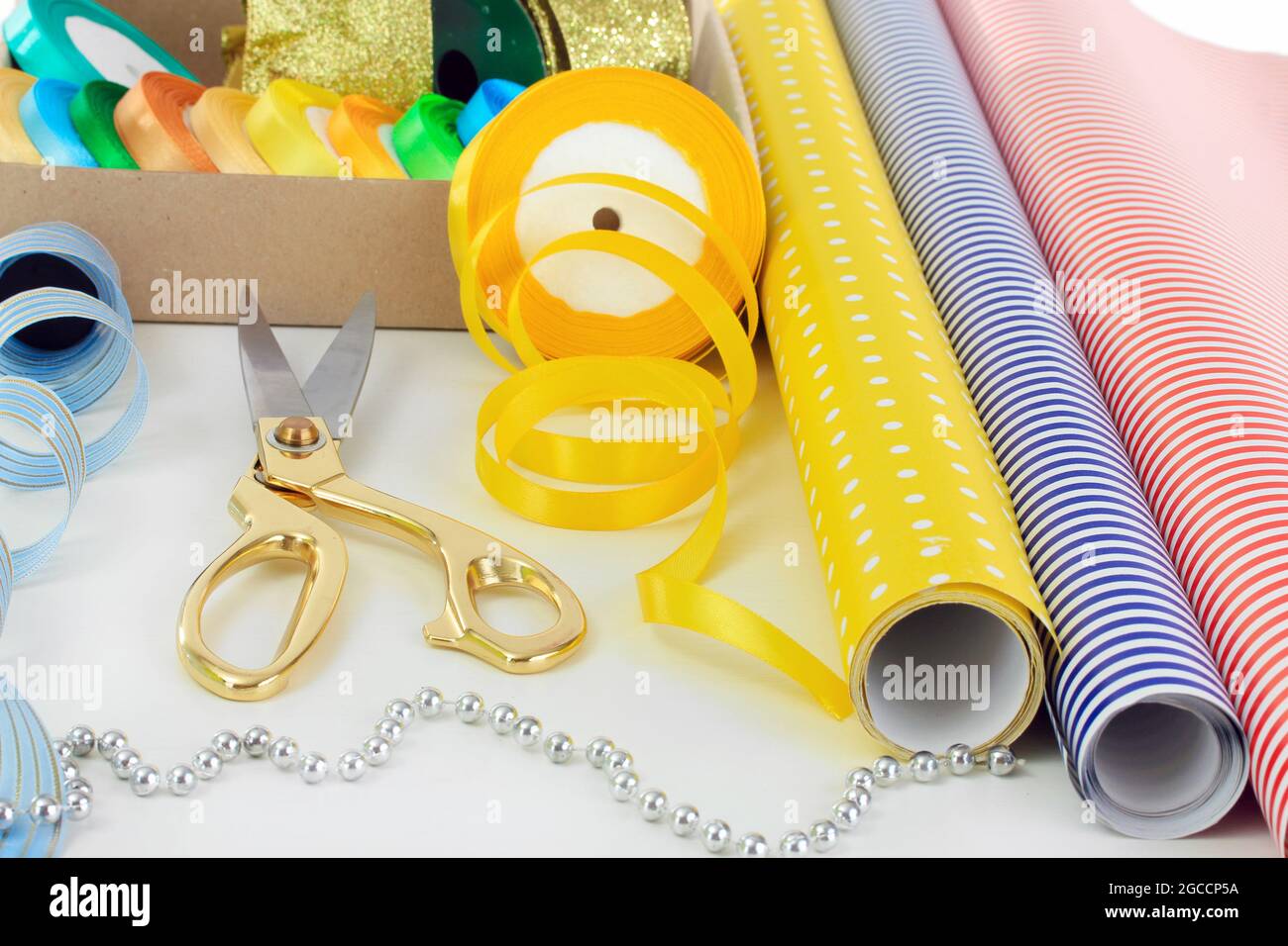 Materials and accessories for wrapping gifts isolated on white Stock ...