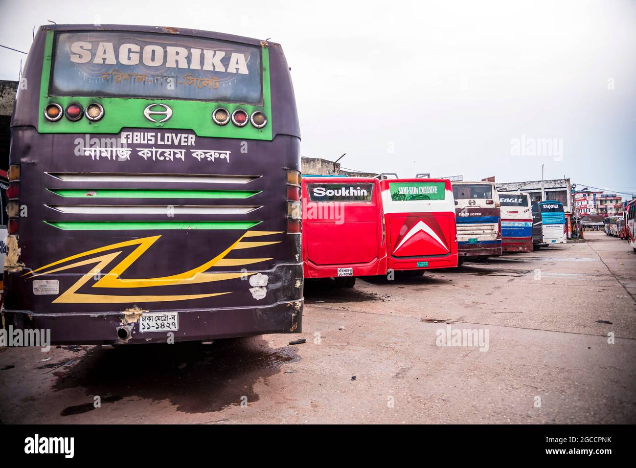 BARISHAL, BANGLADESH - AUGUST 2: Aerial view of buses line up at the ...