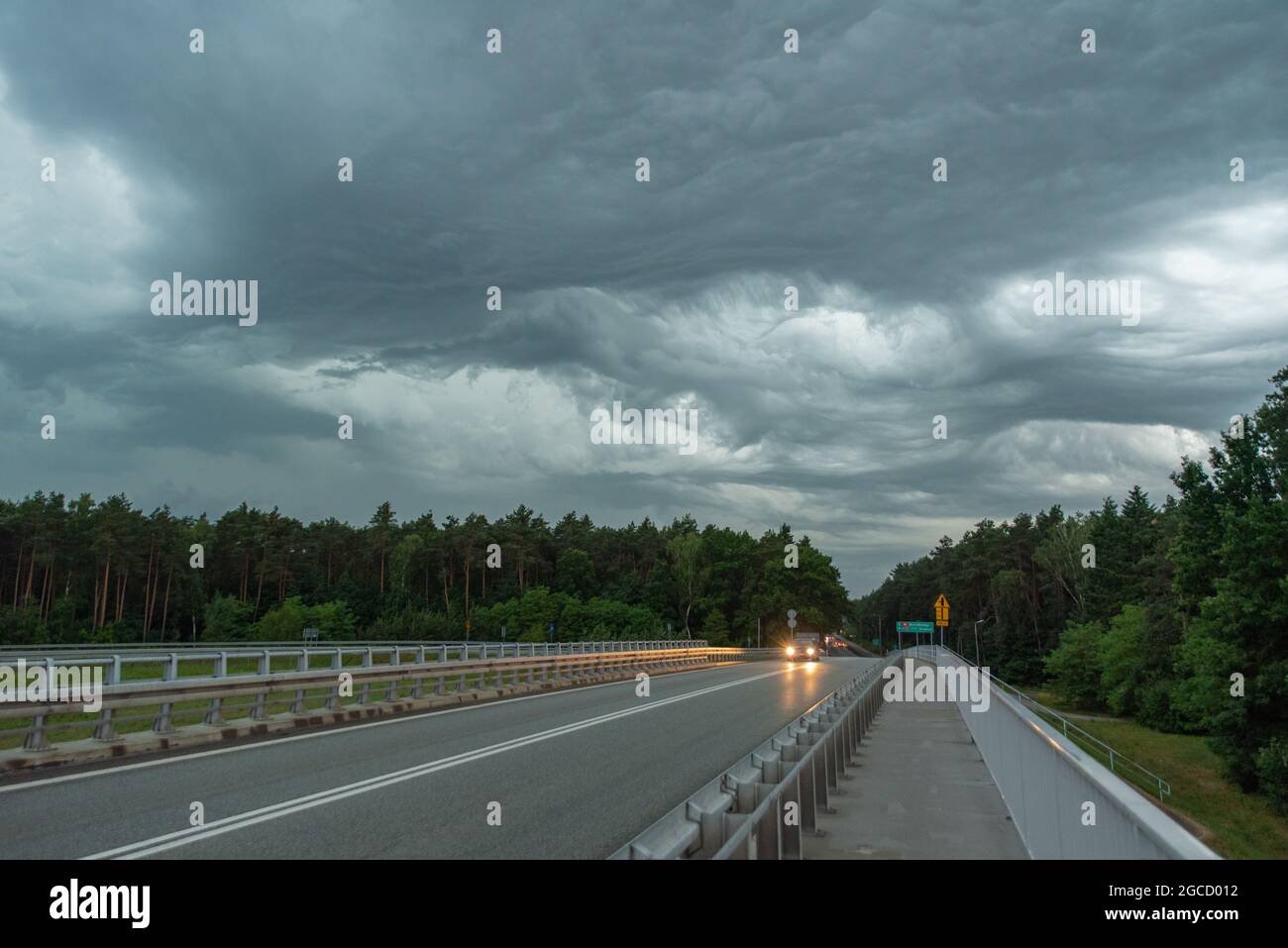 View of the road before the storm Stock Photo - Alamy