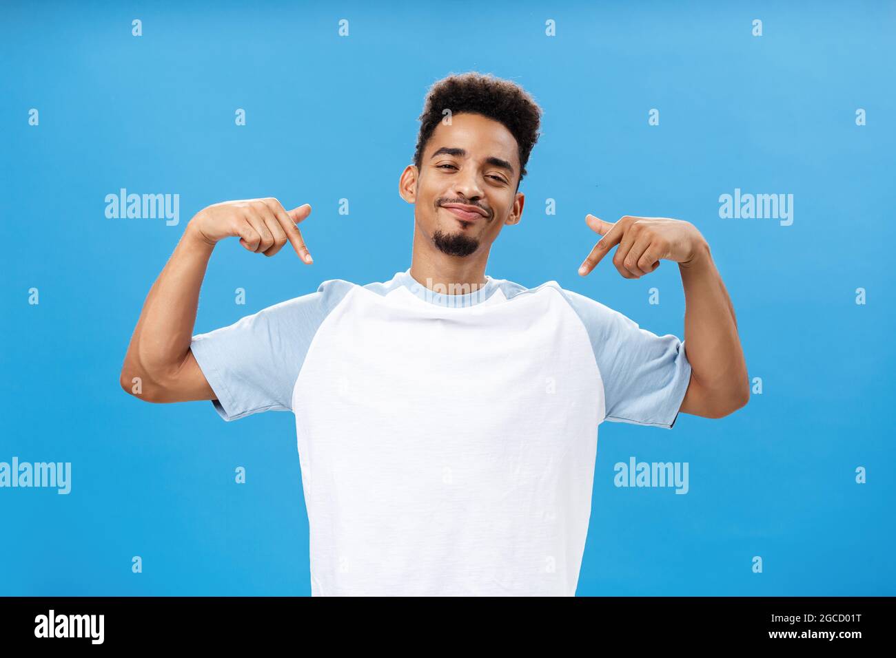 Yeah look how cool I am. Proud arrogant and stylish dark-skinned man ...