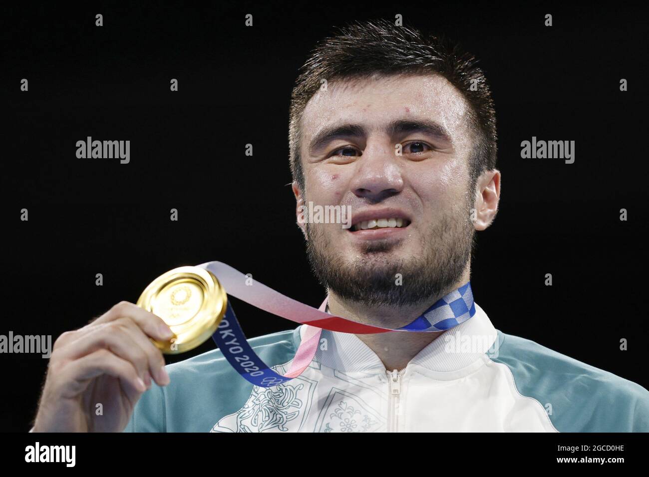 Bakhodir Jalolov of Uzbekistan poses with his gold medal for the men's ...