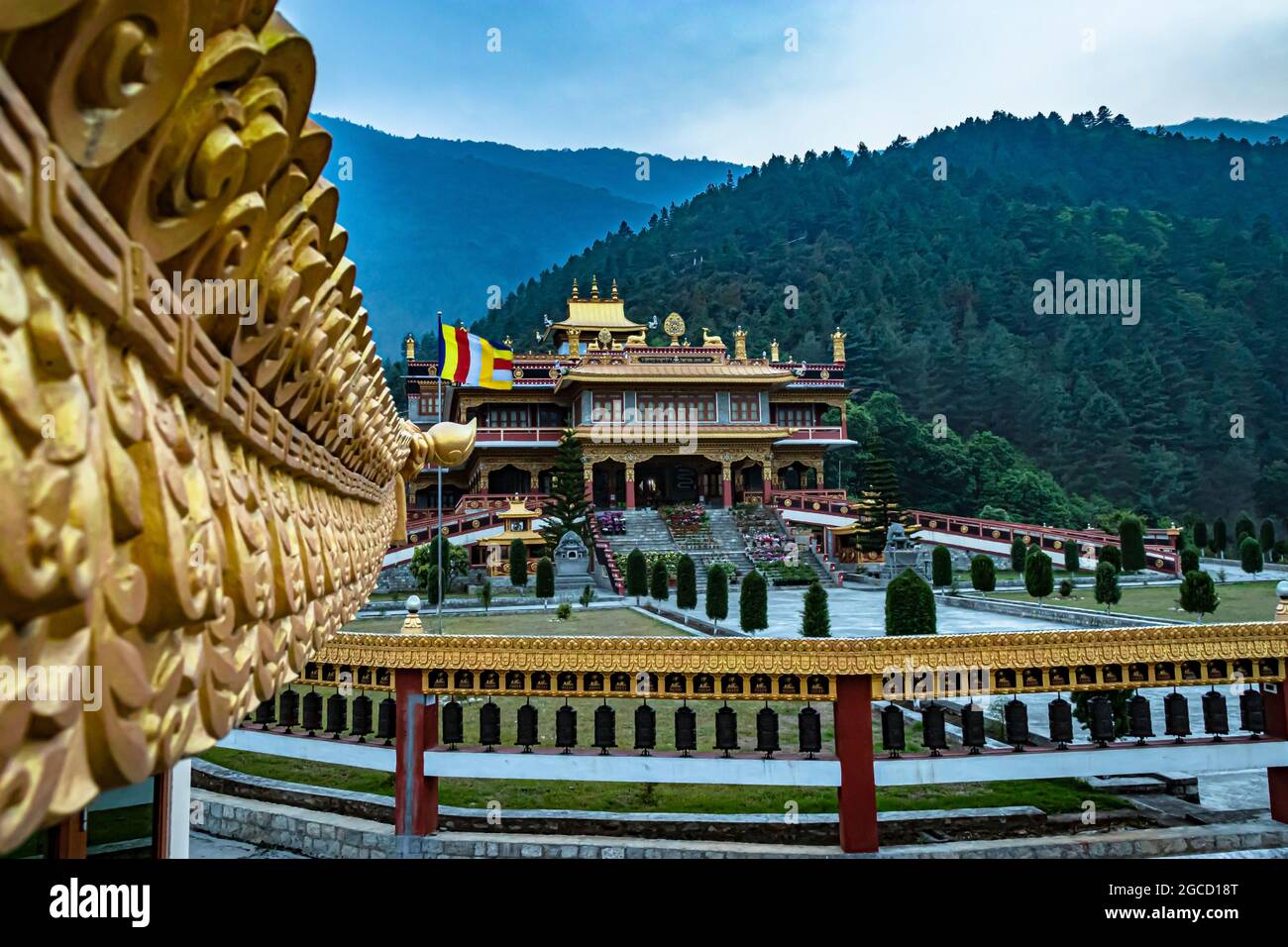 buddhist monastery at himalayan mountain foothills at morning from ...