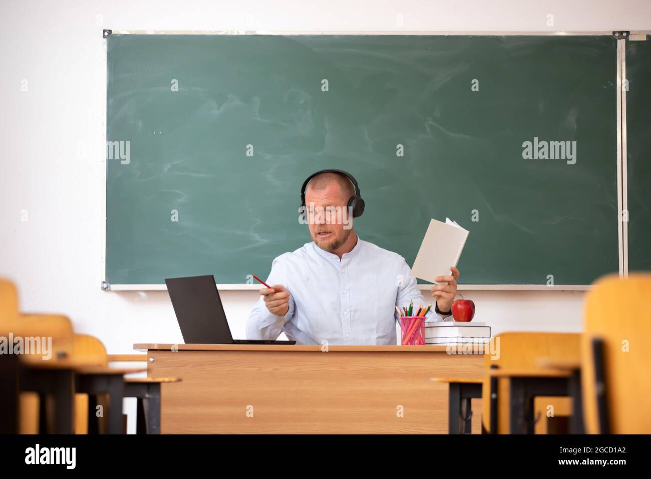 Back to School Concept. School teacher giving virtual teaching remote ...