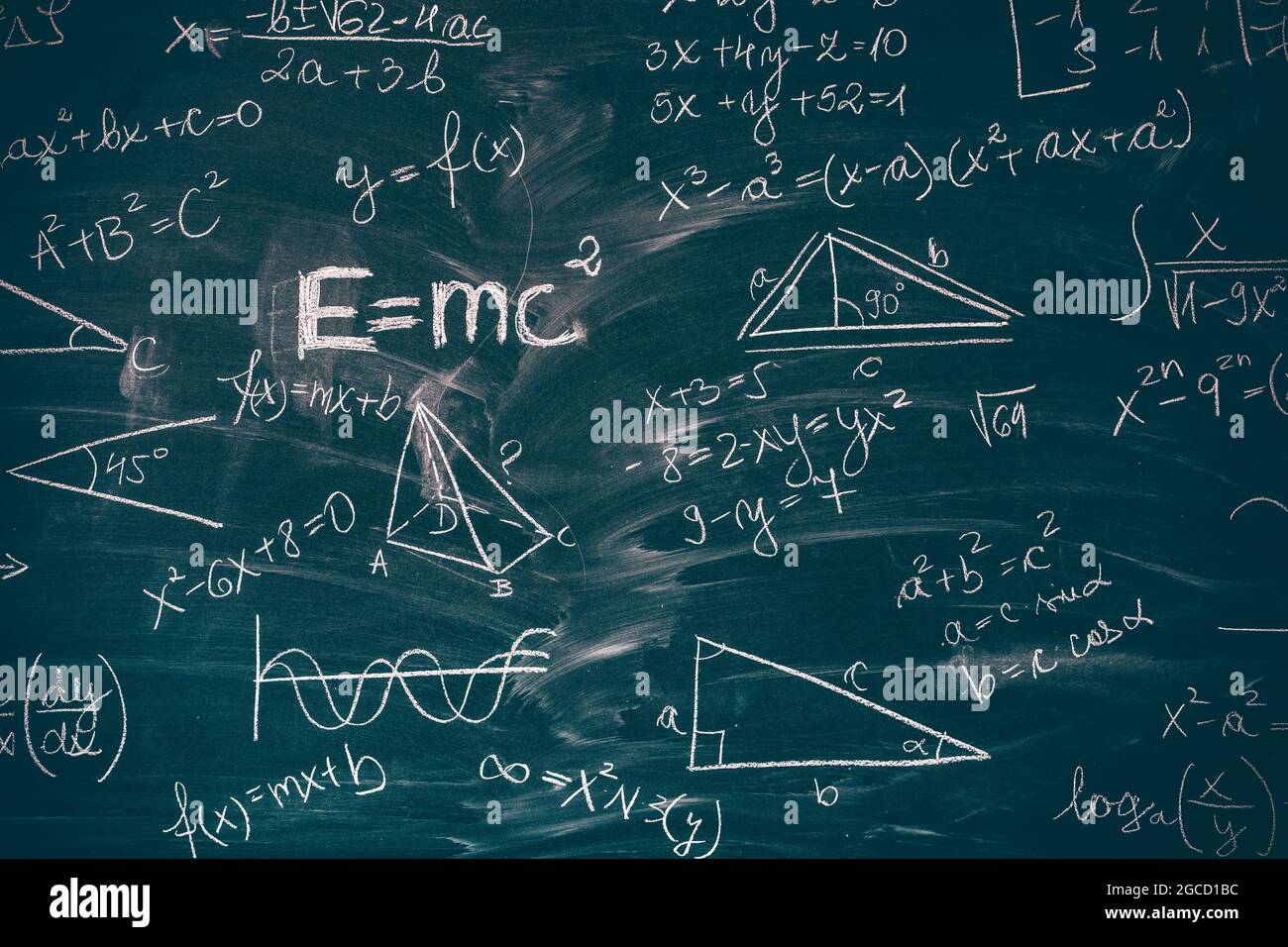 Blackboard inscribed with scientific formulas and calculations in ...