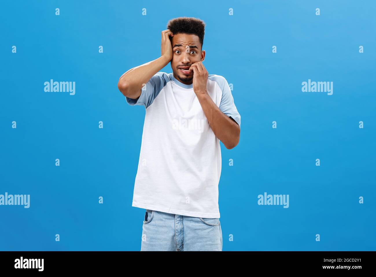 Insecure anxious guy getting scared of consequences. Portrait of ...