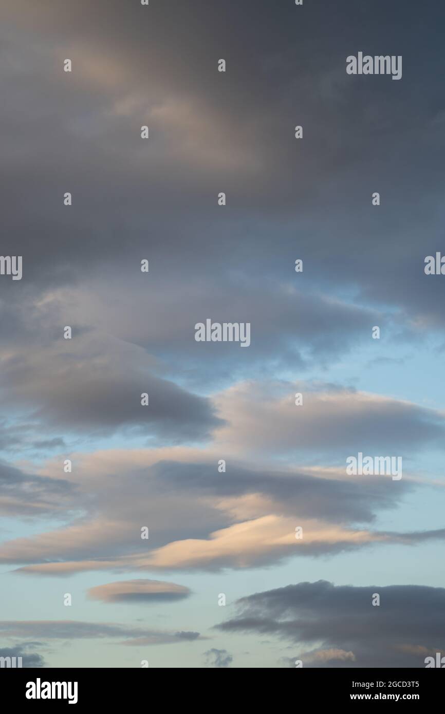 Dramatic cloudscape with soft pastel colours over Scottish island ...