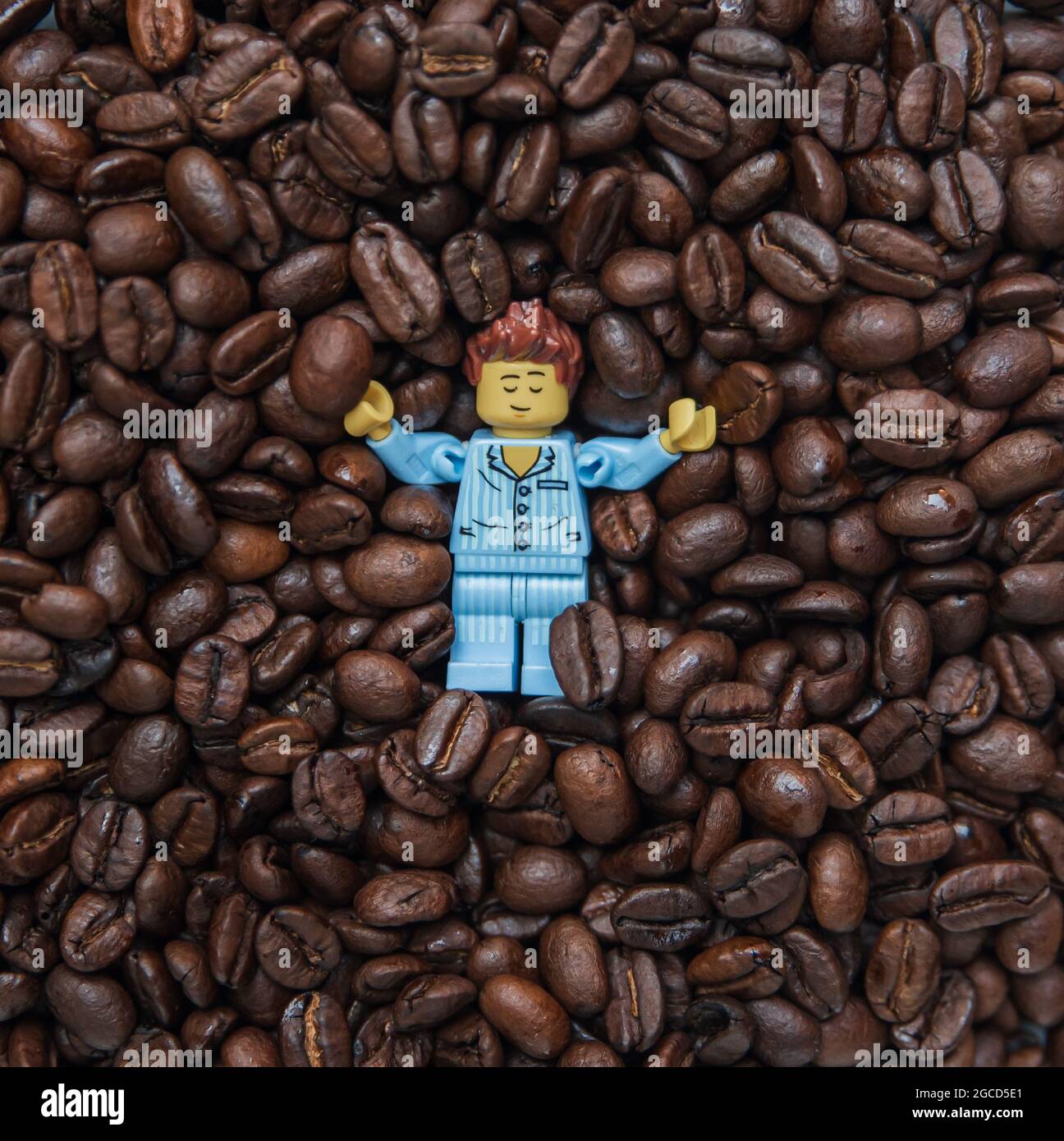 Lego minifigure slepping in the coffee Stock Photo - Alamy