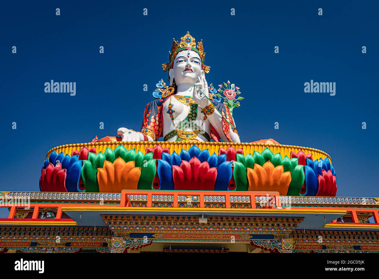 buddhist colorful goddess statue with flat blue sky at morning image is ...