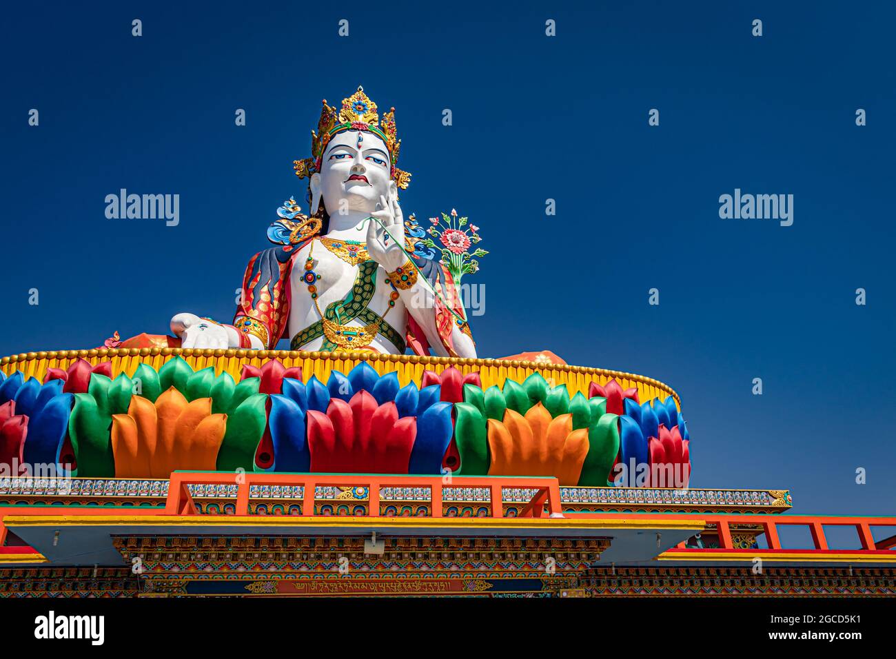 buddhist colorful goddess statue with flat blue sky at morning image is ...