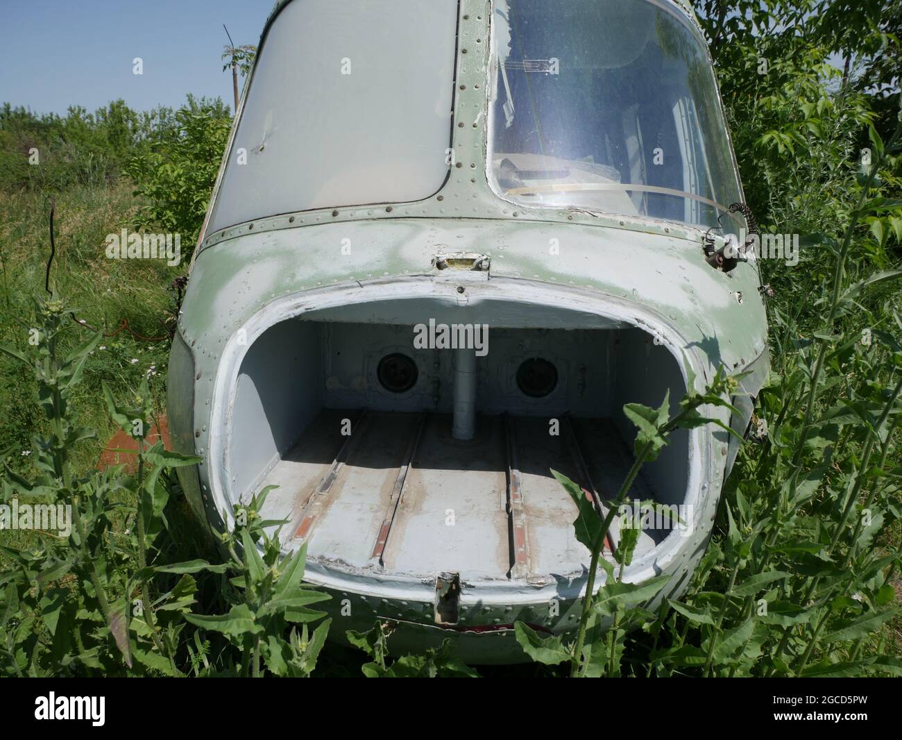 Old military abandoned helicopter. Broken non-working helicopter green ...