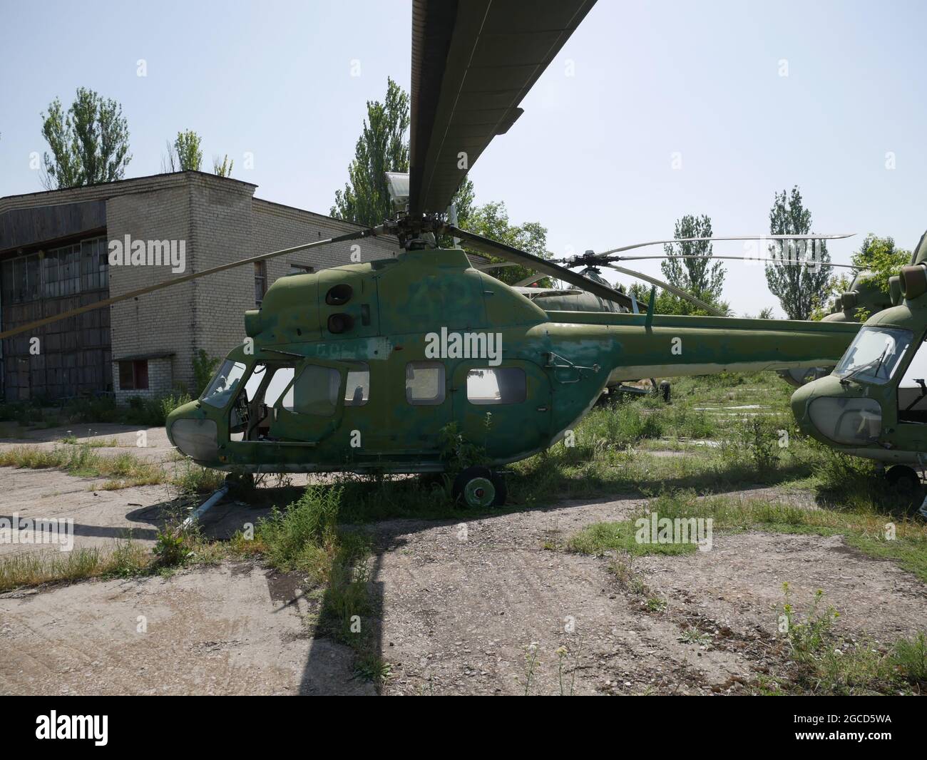 Old military abandoned helicopter. Broken non-working helicopter green ...