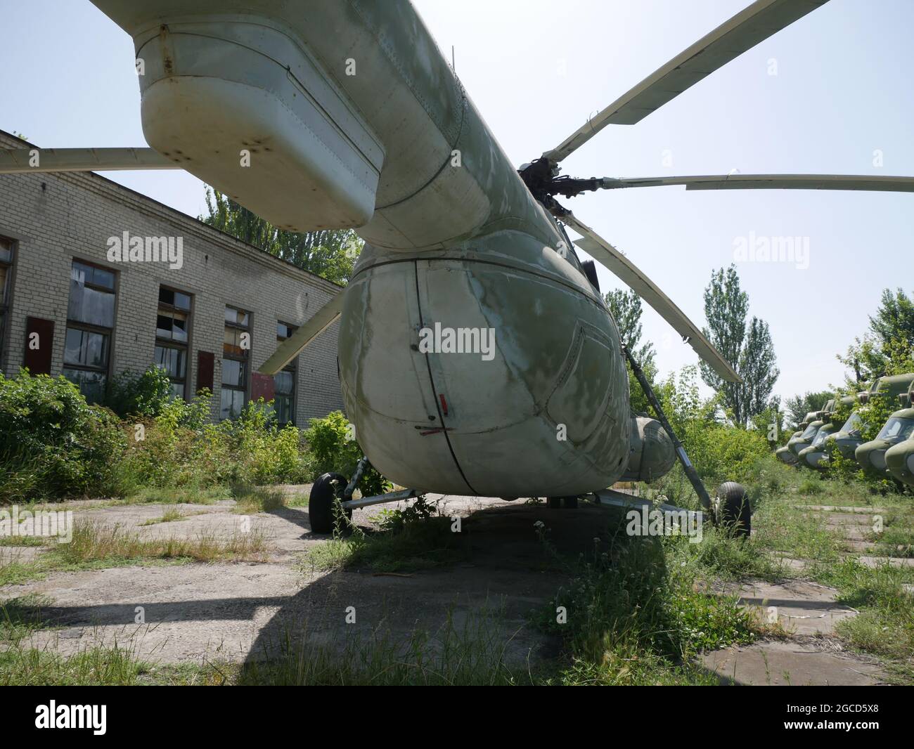 Old military abandoned helicopter. Broken non-working helicopter green ...