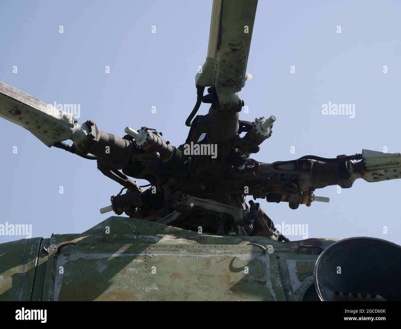 Old military abandoned helicopter. Broken non-working helicopter green ...