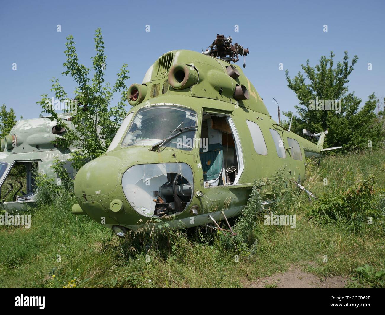 Old military abandoned helicopter. Broken non-working helicopter green ...