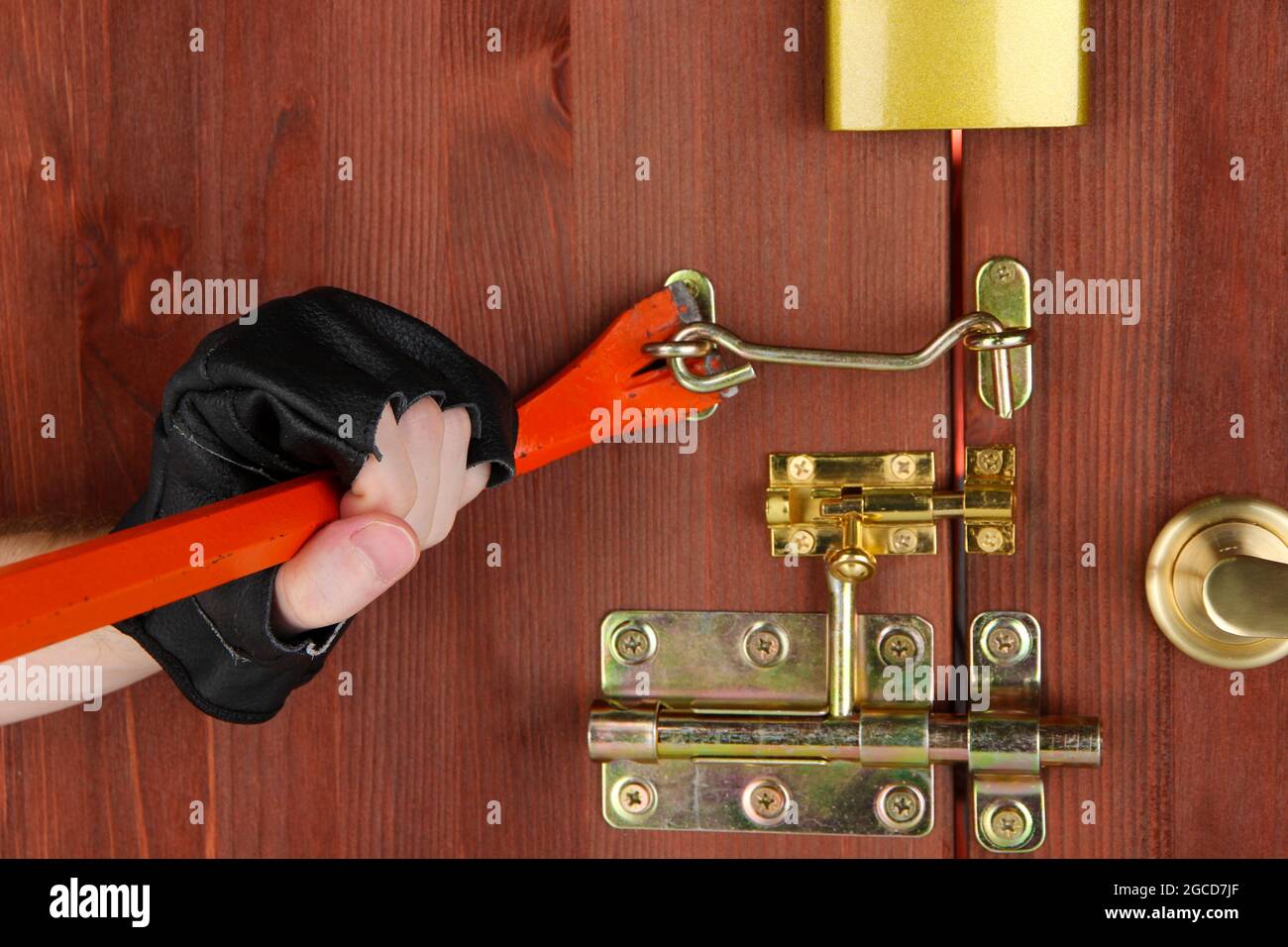 Robber breaks castle in door close-up Stock Photo - Alamy