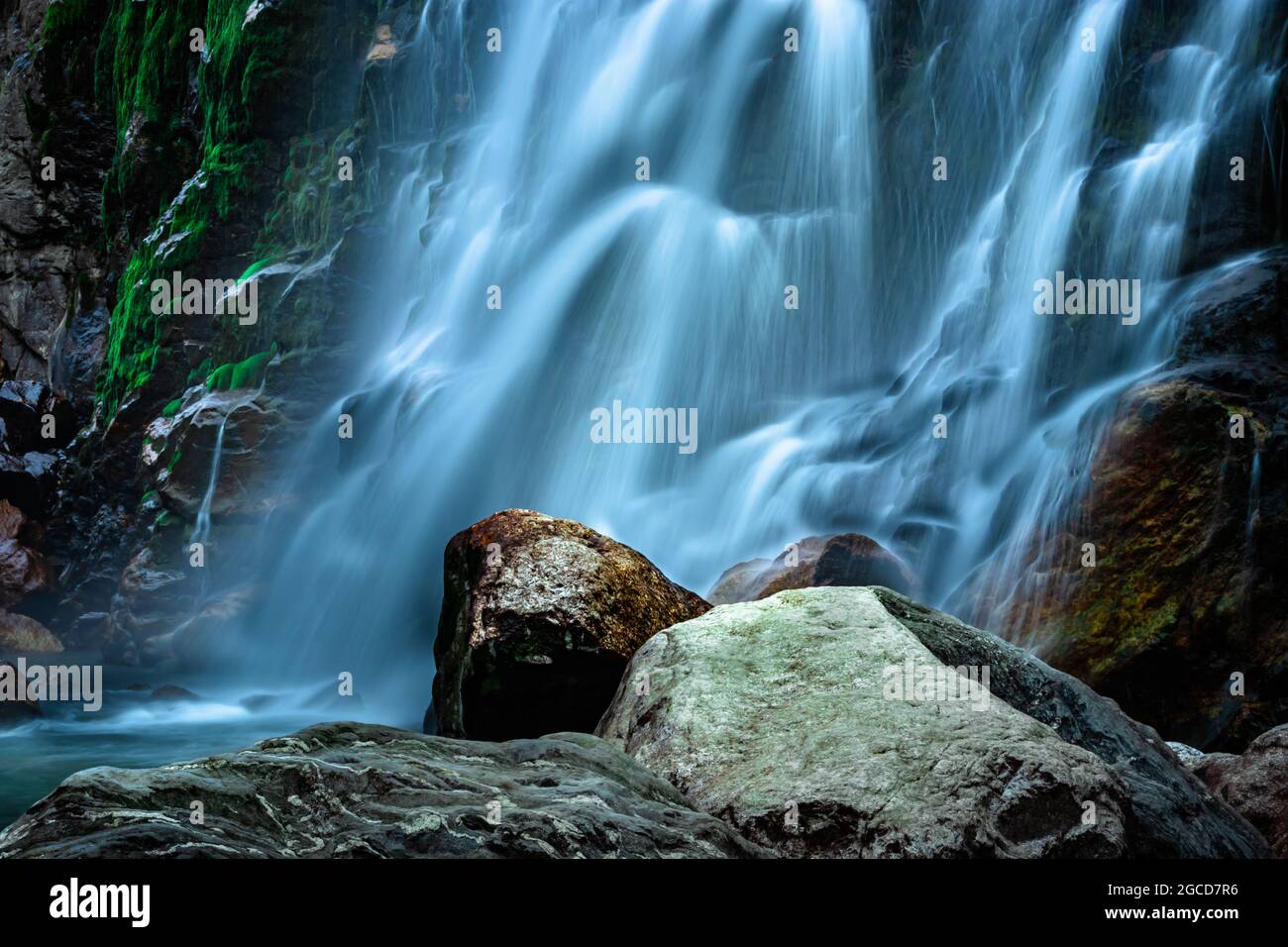 waterfall white water stream falling from mountains at day long ...