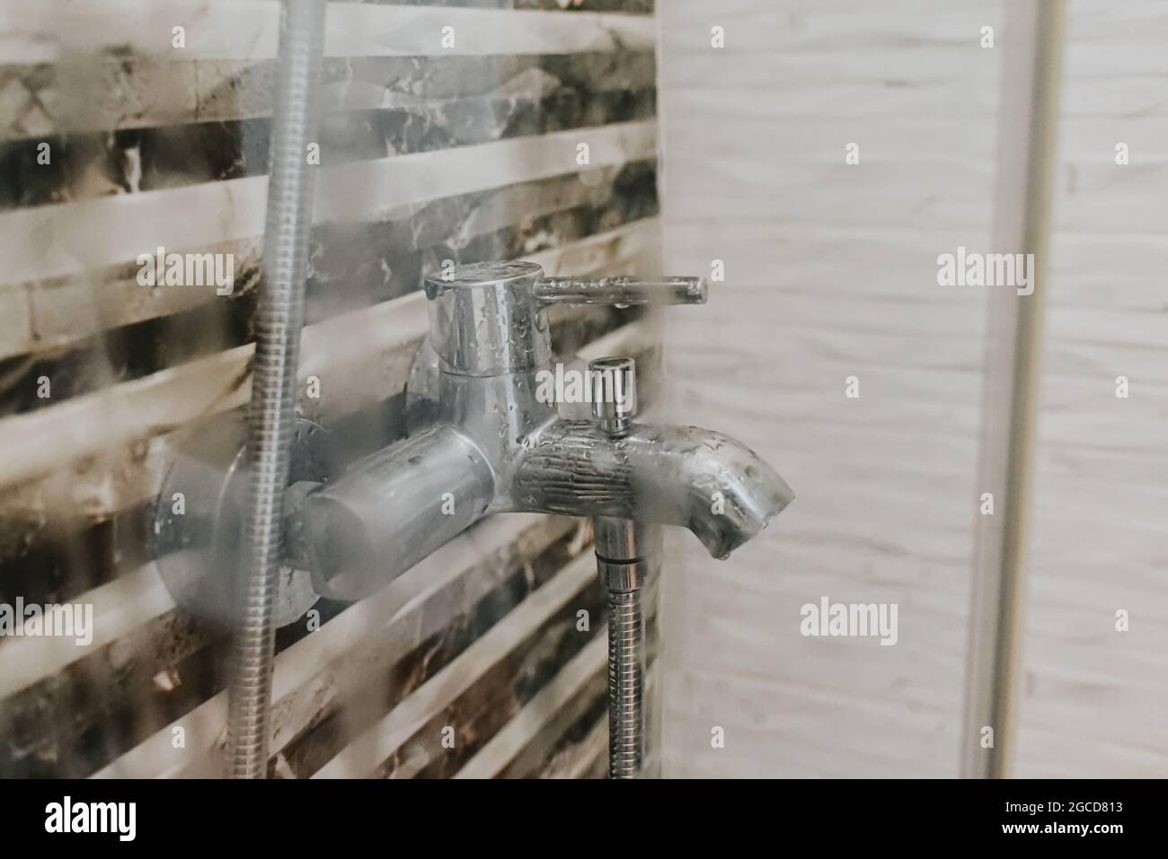 shower faucet view through the glass Stock Photo - Alamy