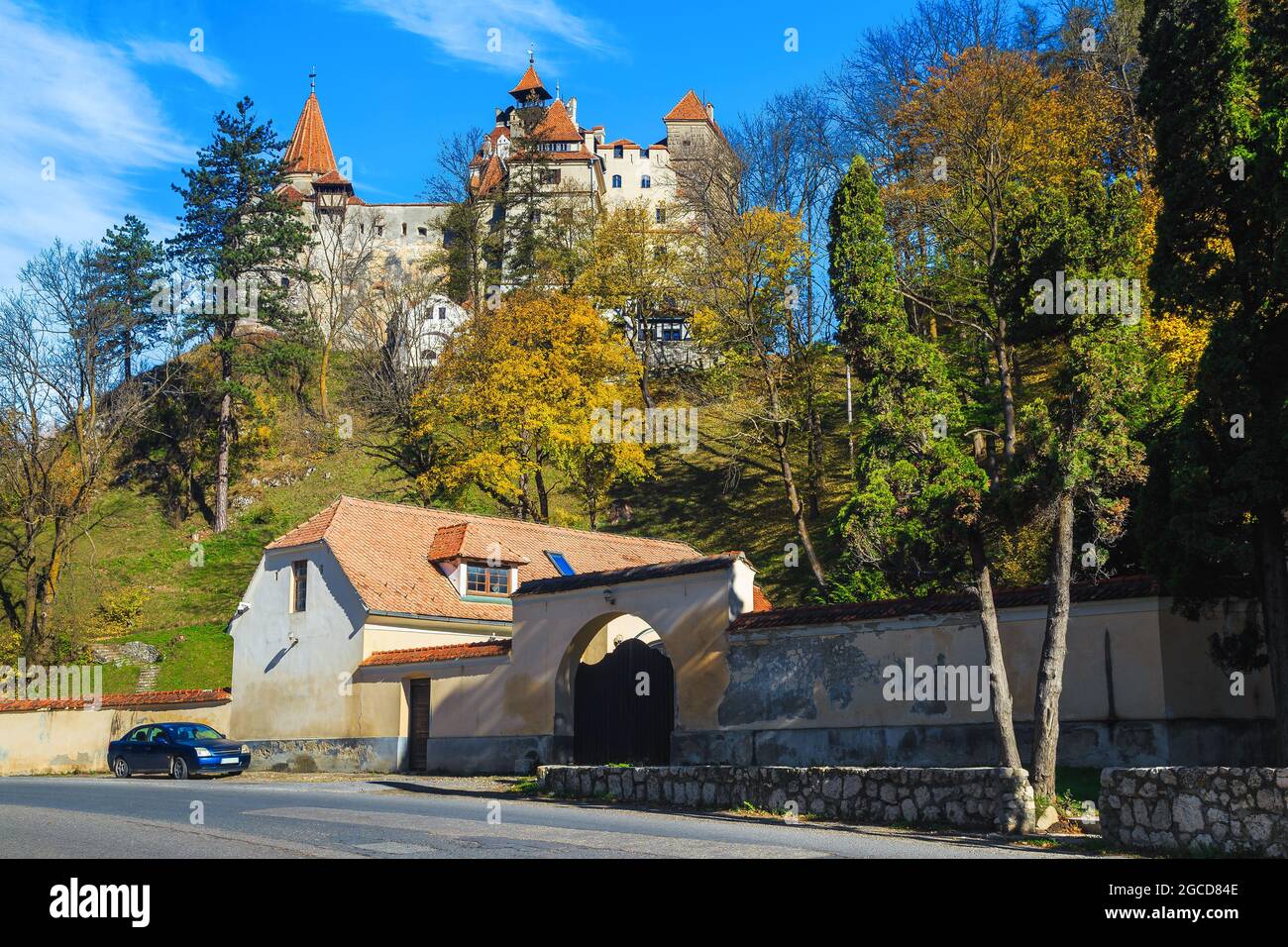 Picturesque Dracula castle on the hill and autumn scenery with colorful ...