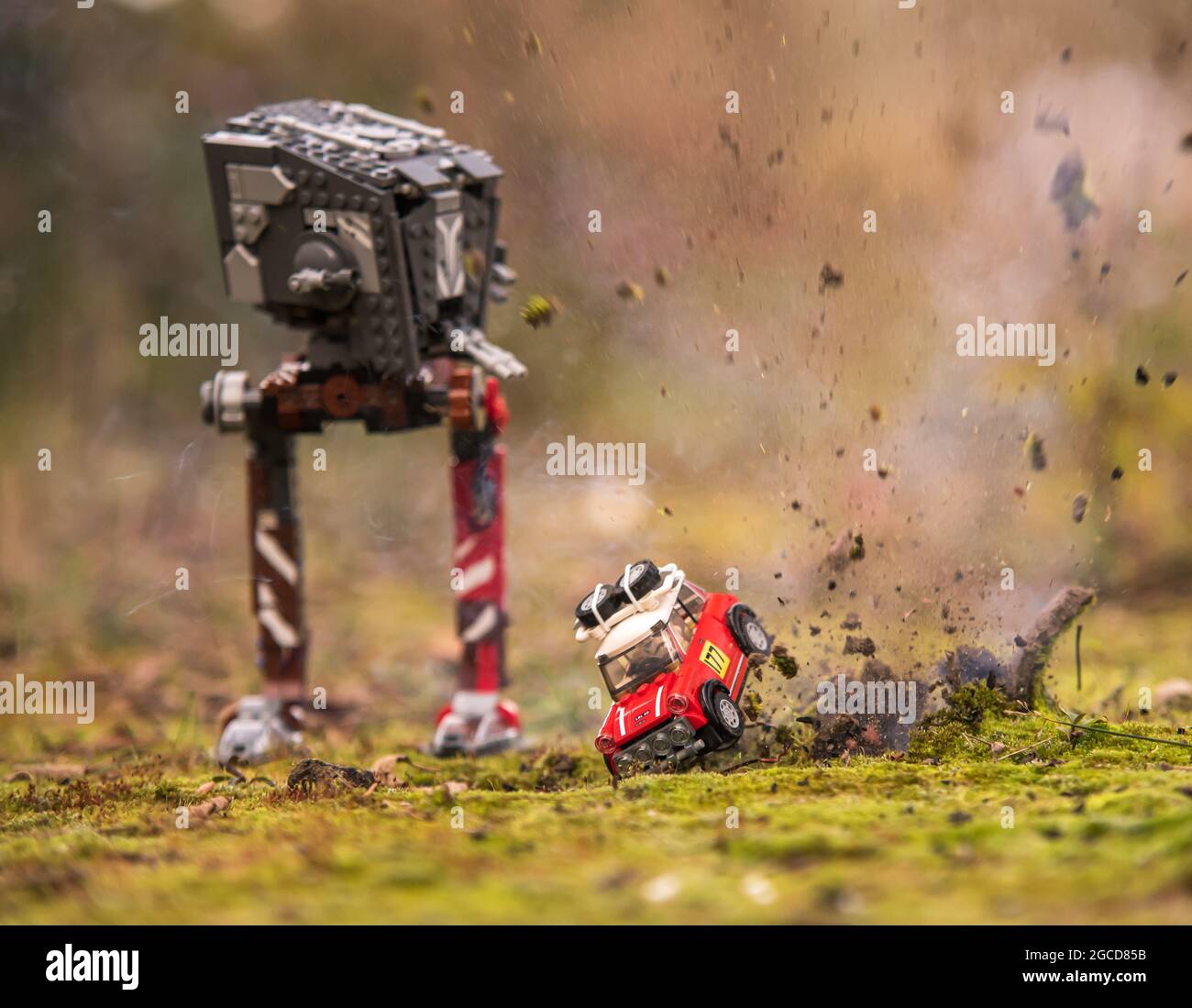 Lego car minicooper running from AT-ST walker Stock Photo - Alamy