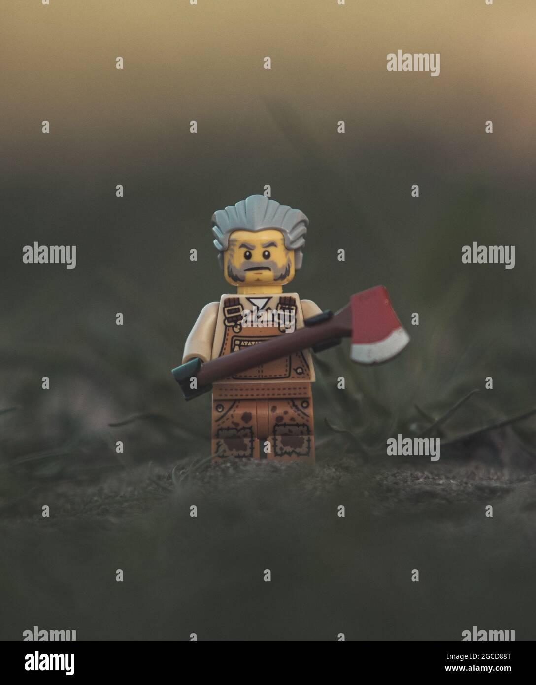 Lego minifigure guy with axe Stock Photo - Alamy
