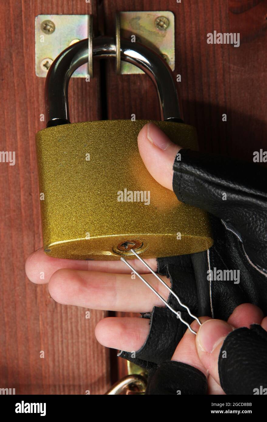Robber breaks castle in door close-up Stock Photo - Alamy
