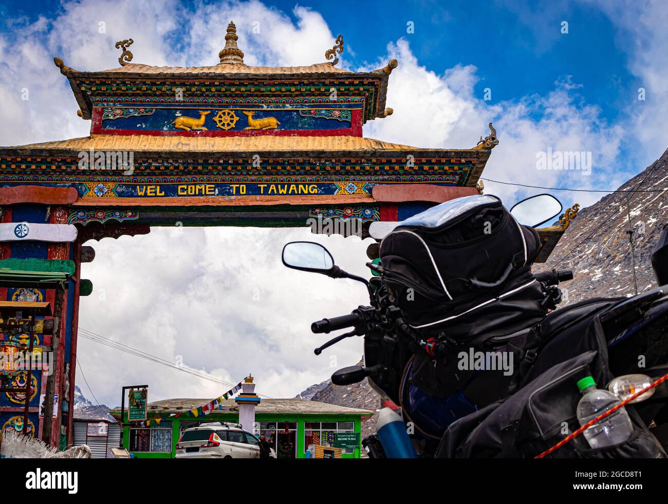 biker loaded motorcycle at mountain pass with bright blue sky at day ...