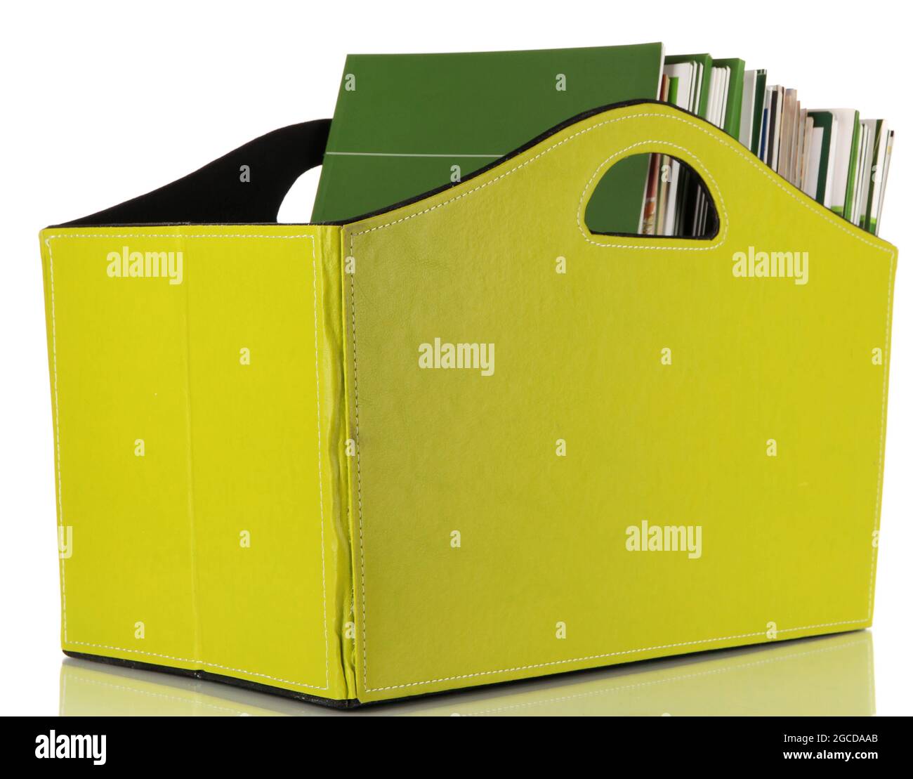 Magazines and folders in green box, isolated on white Stock Photo - Alamy