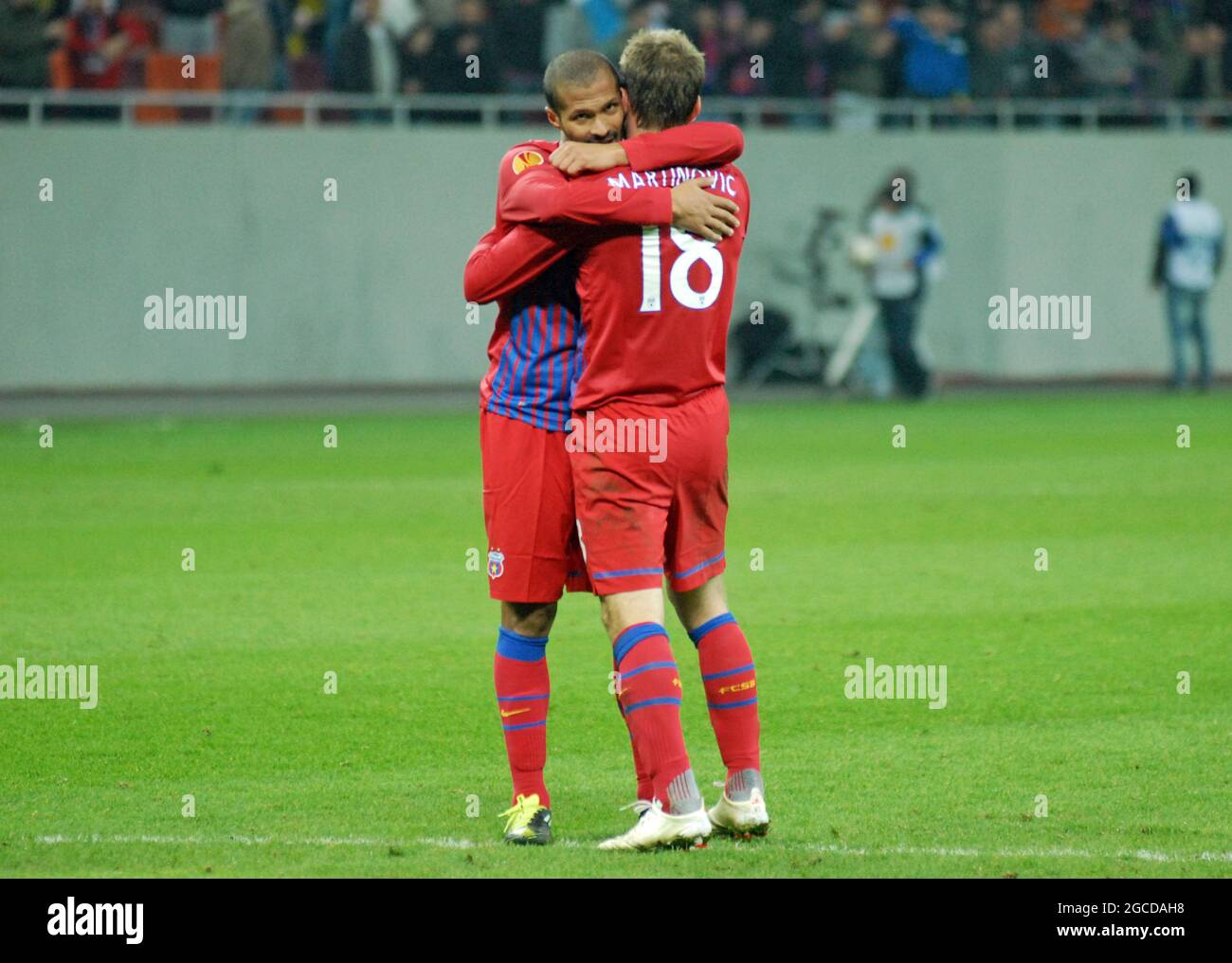 BUCHAREST, ROMANIA - NOVEMBER 3, 2011: Geraldo Alves of FCSB hugs Novak ...