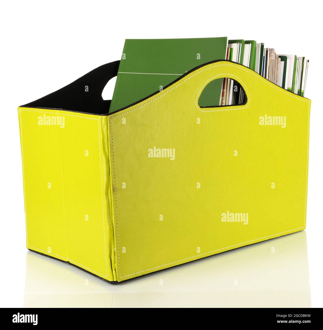 Magazines and folders in green box, isolated on white Stock Photo - Alamy