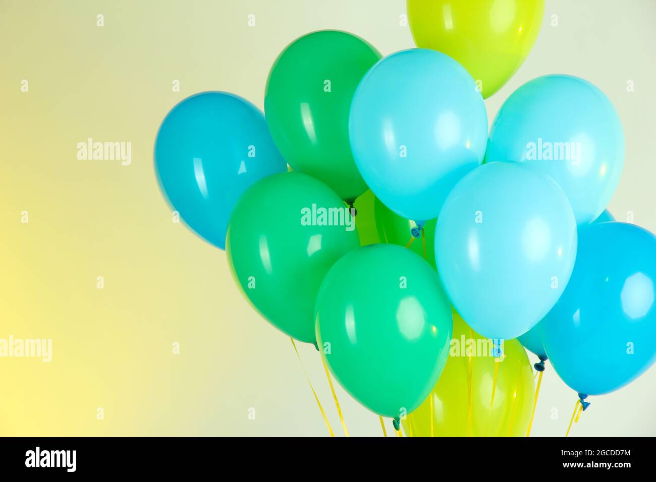 Colorful balloons on color background Stock Photo - Alamy