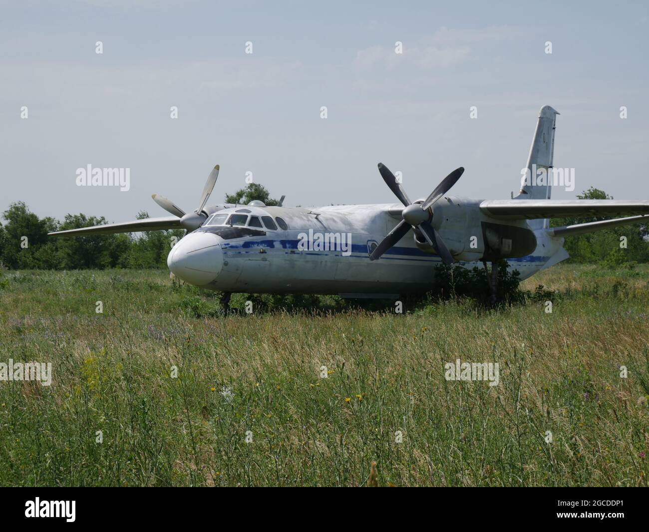Old abandoned passenger plane. There is a broken plane in the wasteland ...