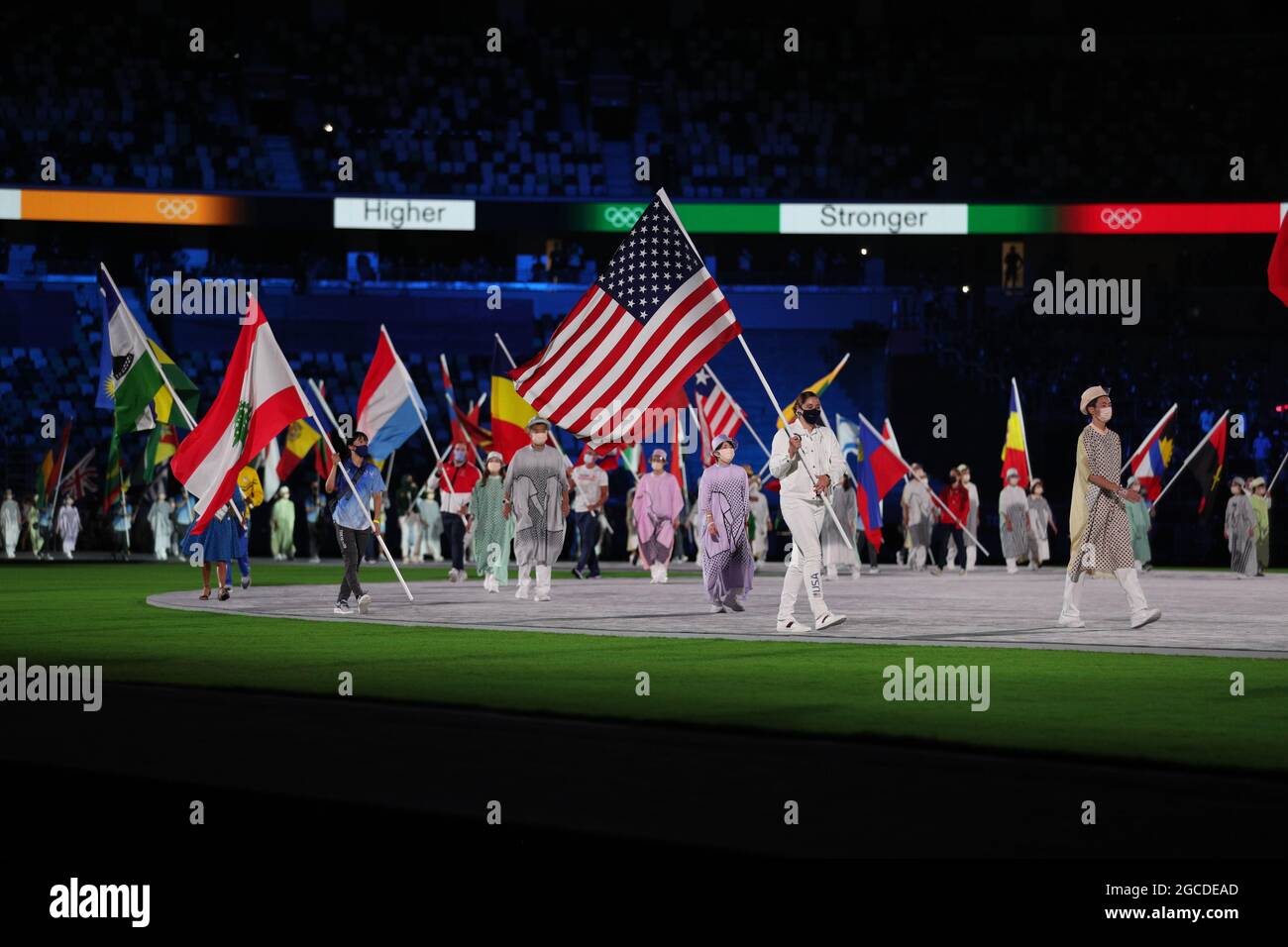 Tokyo, Japan. 8th Aug, 2021. Flag bearers parade into the Olympic ...