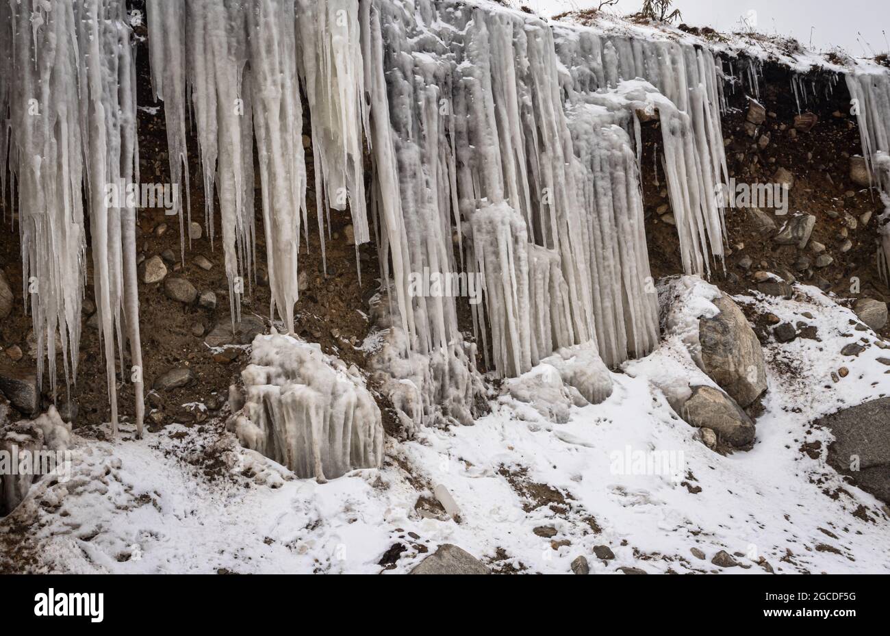 frozen icicles sticking at mountain peak at winter in morning Stock ...