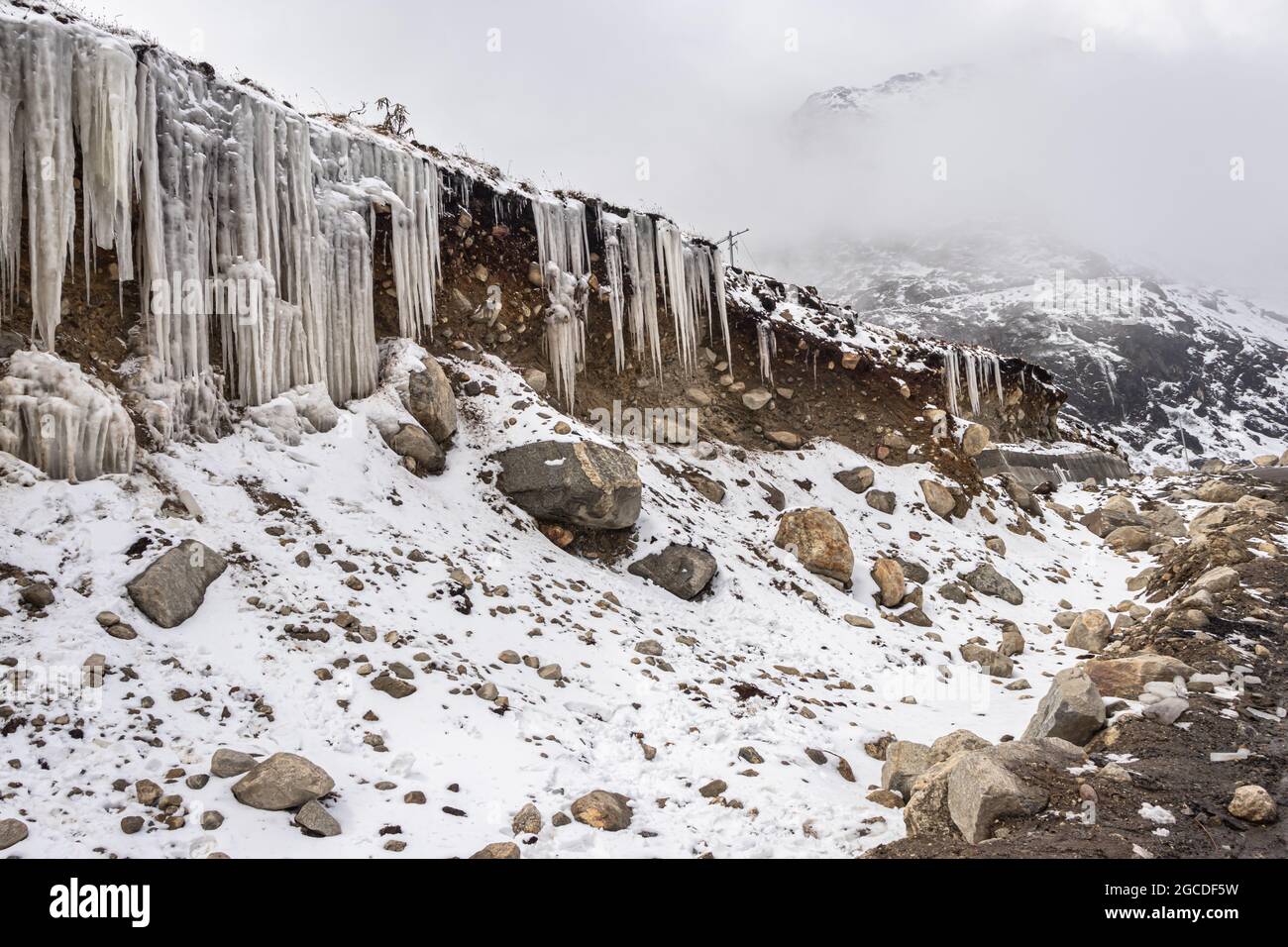 frozen icicles sticking at mountain peak at winter in morning Stock ...